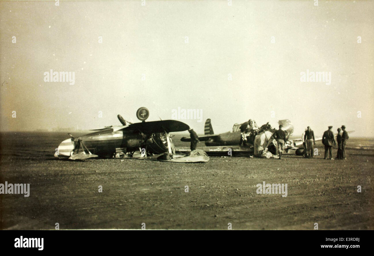 This image captures the aftermath of an aircraft accident, highlighting ...