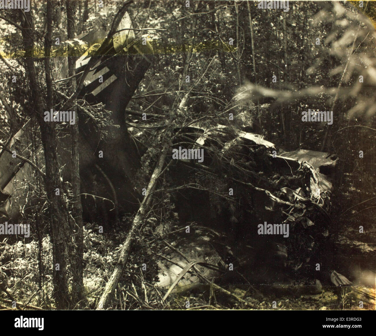 This image documents the crash of a Douglas A-1 Skyraider, a U.S. Navy ...