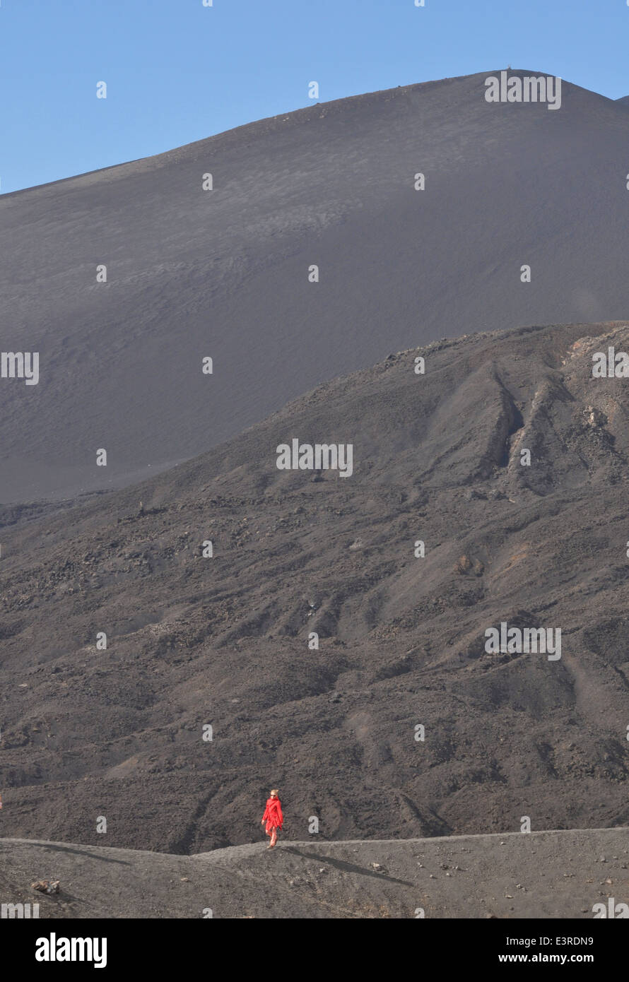 Volcano Etna, woman in red, Catania, Sicily, Italy, Europe Stock Photo ...