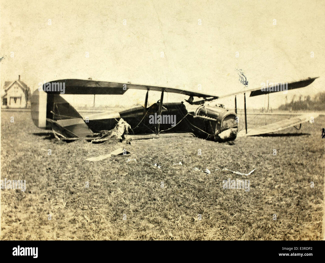 This image depicts the aftermath of an aircraft accident, showcasing ...