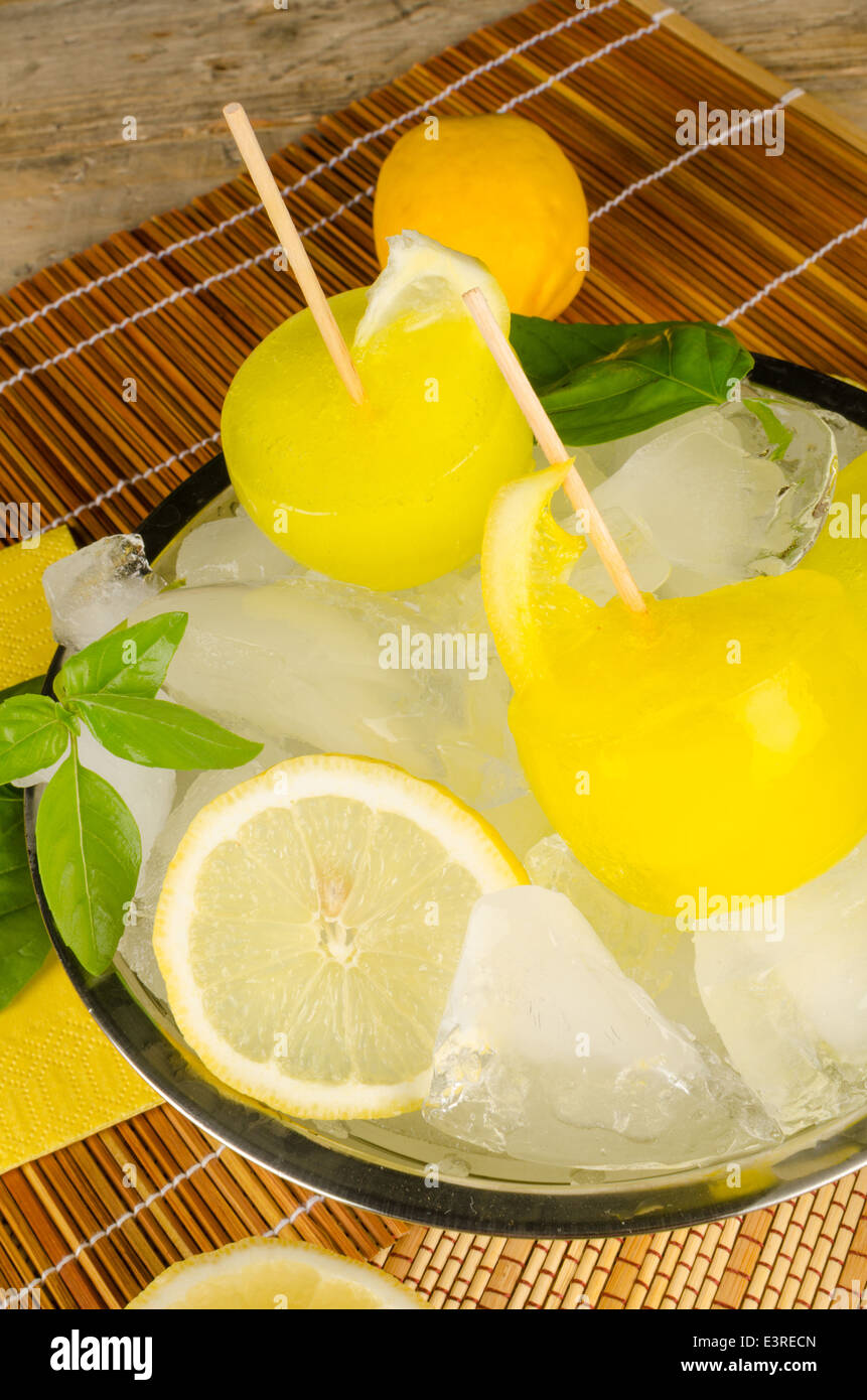A bowl with homemade lemon ice pops Stock Photo - Alamy