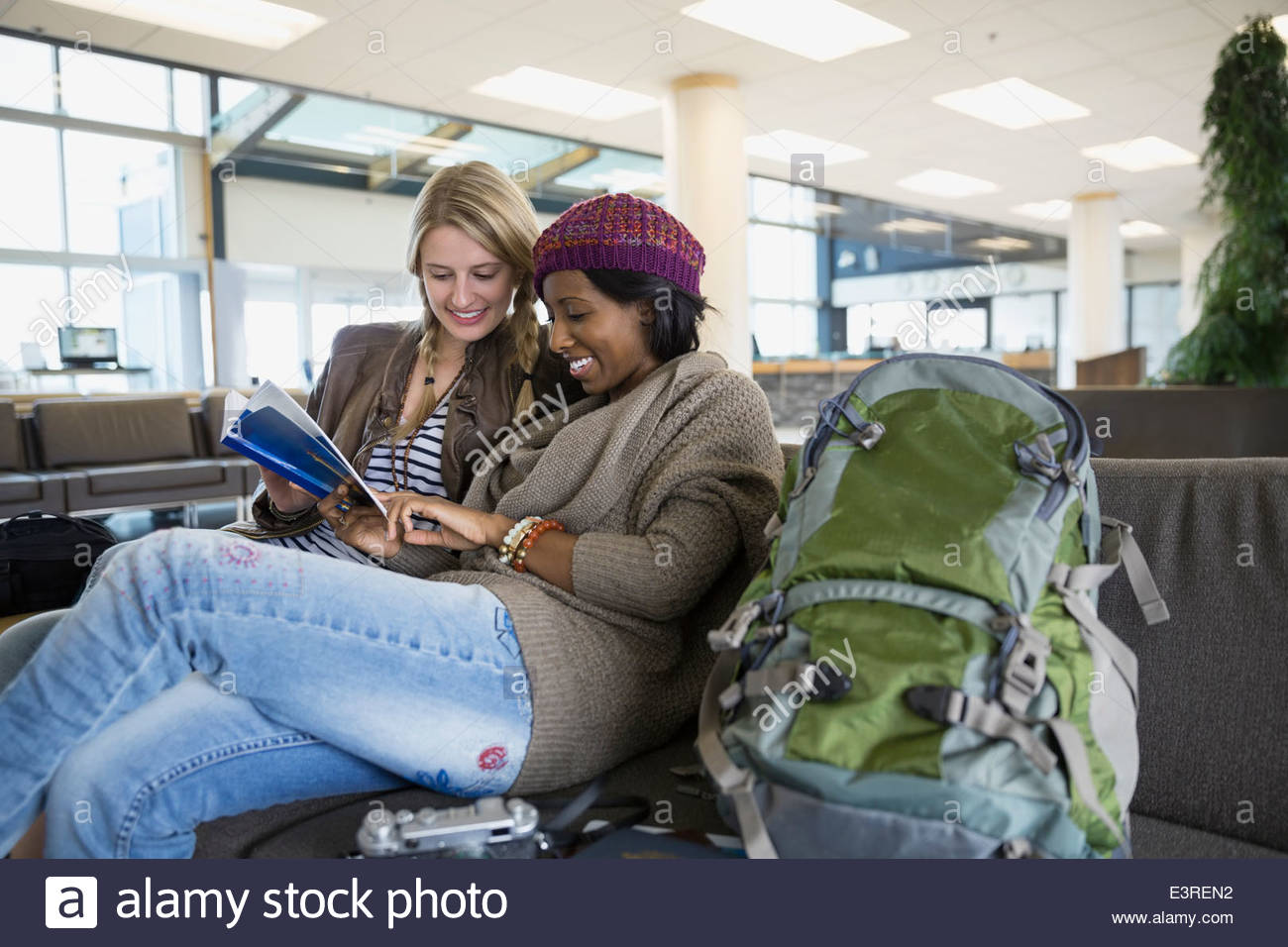 Lady reading guidebook hi-res stock photography and images - Alamy