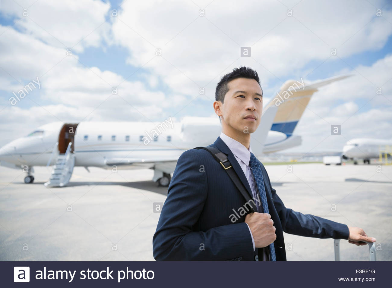 Businessman departing an airplane hi-res stock photography and images ...
