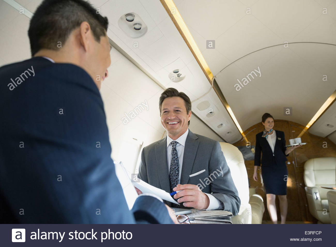 Businessman flight attendant laughing on hi-res stock photography and ...