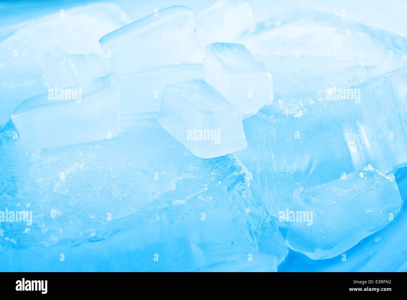 Ice cubes as background.Crushed ice close up Stock Photo - Alamy