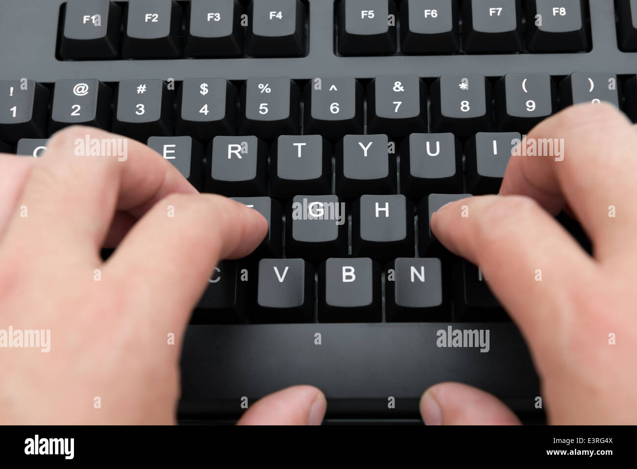 male typing a black keyboard Stock Photo - Alamy
