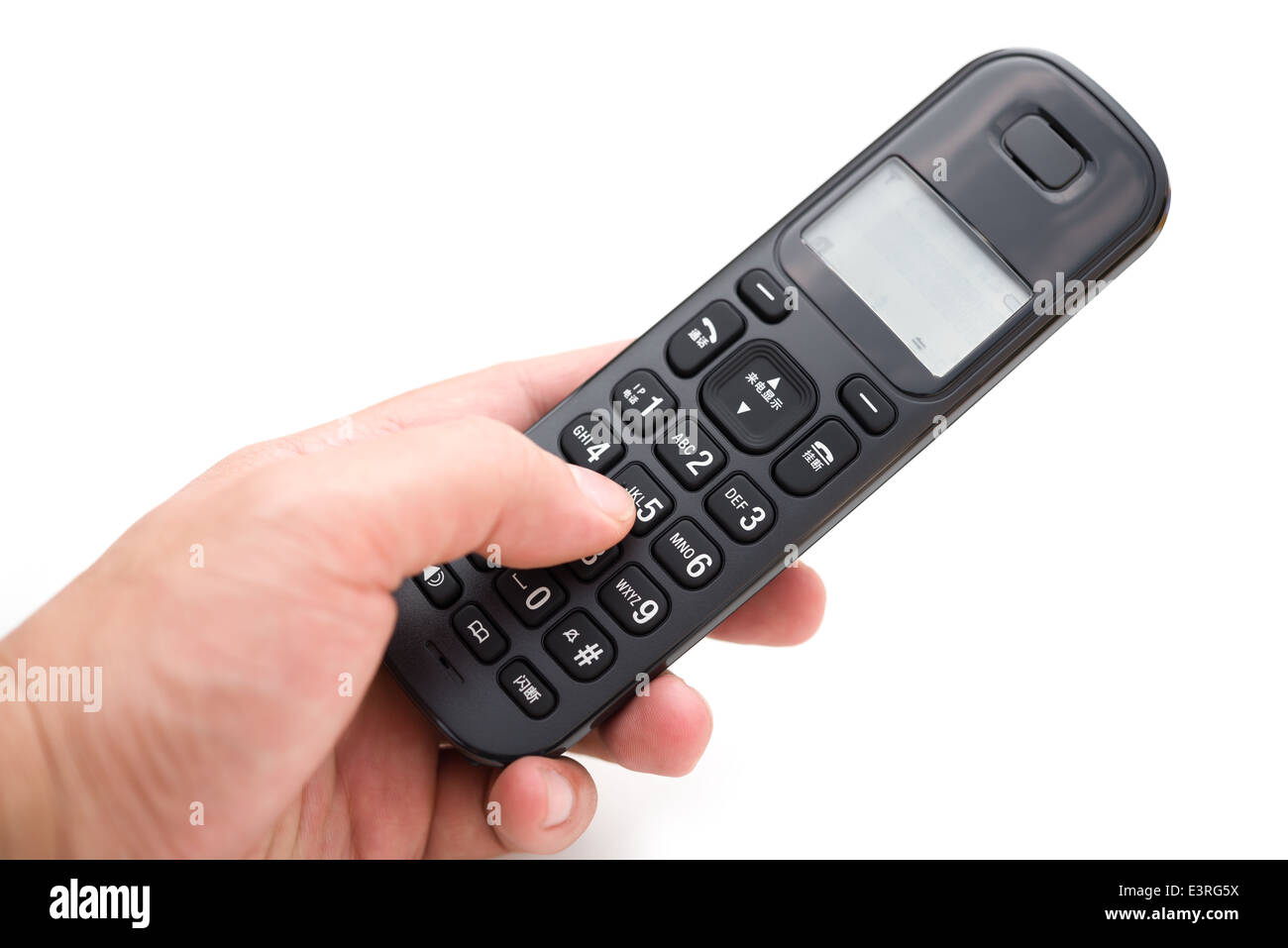man dialing a wireless telephone with clipping path Stock Photo - Alamy man dialing a wireless telephone with clipping path Stock Photo - Alamy