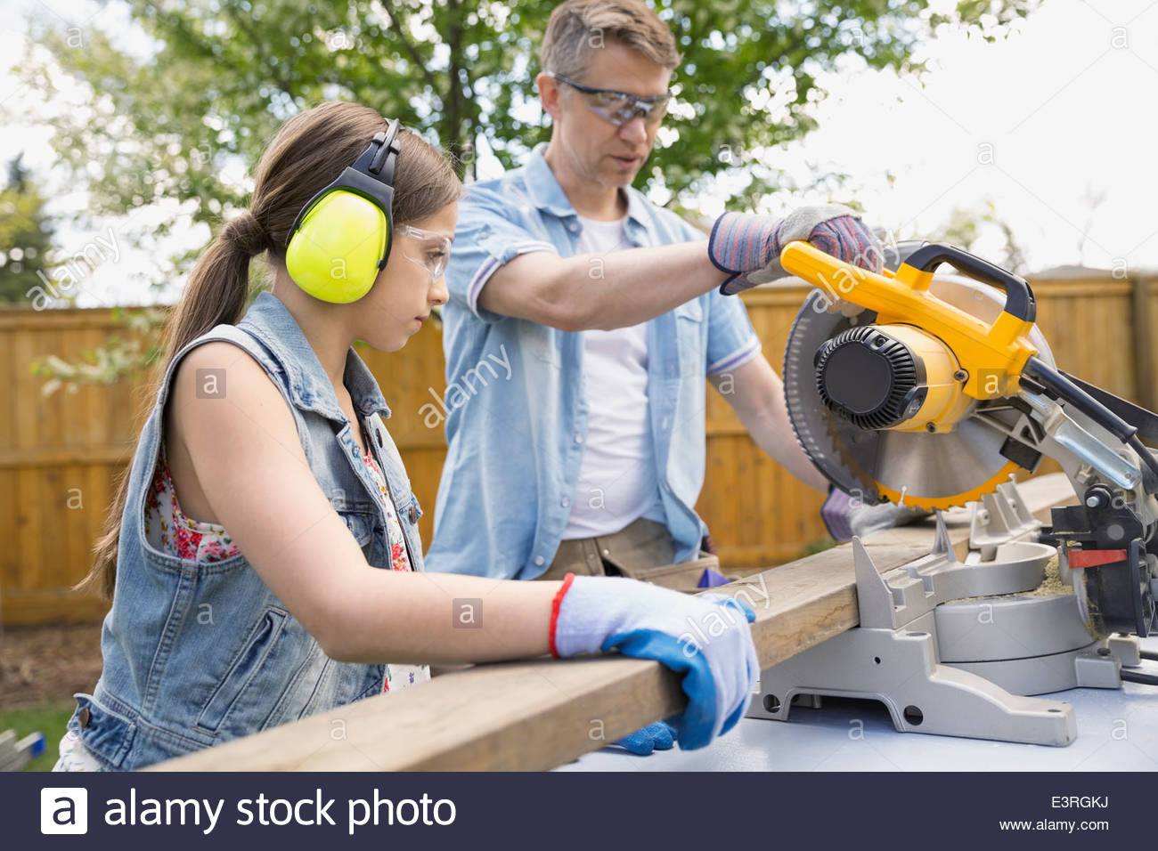 Father educating his daughter hi-res stock photography and images - Alamy