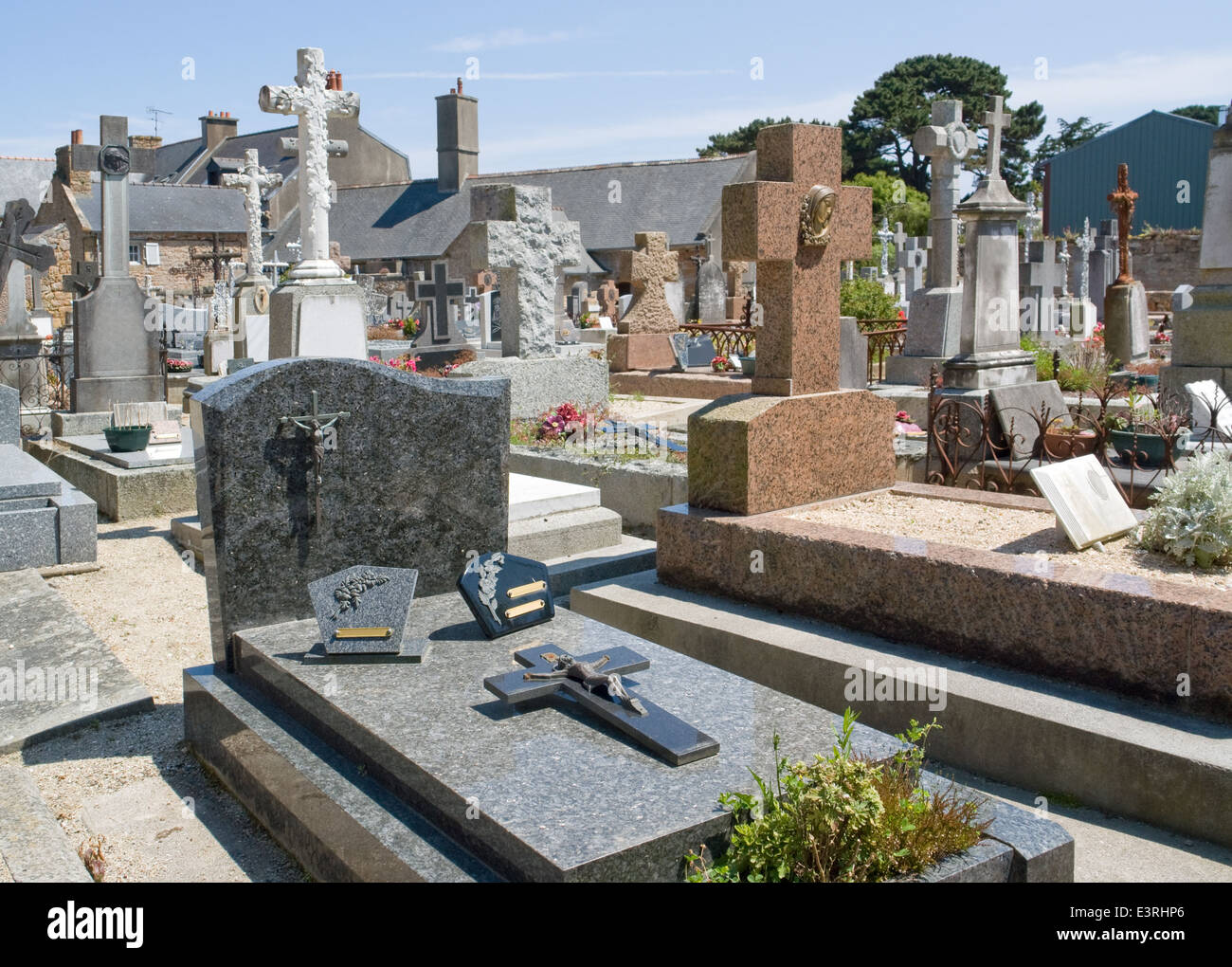 sunny illuminated scenery at a cemetery on the Ile de Brehat in ...