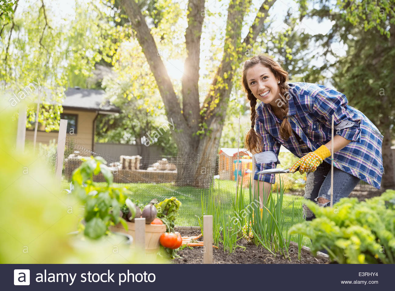 Woman drink garden looking at camera hi-res stock photography and ...