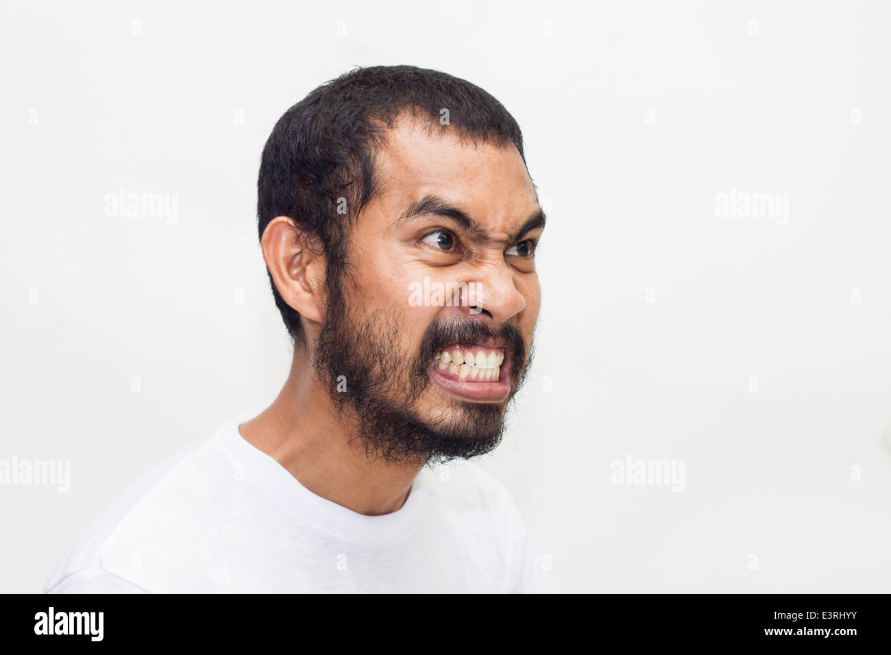 The portrait of angry asian man Stock Photo - Alamy