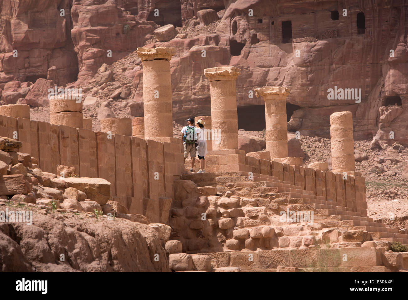 Jordan, Arabah, Petra, tourists on steps of Grand Temple of Winged ...