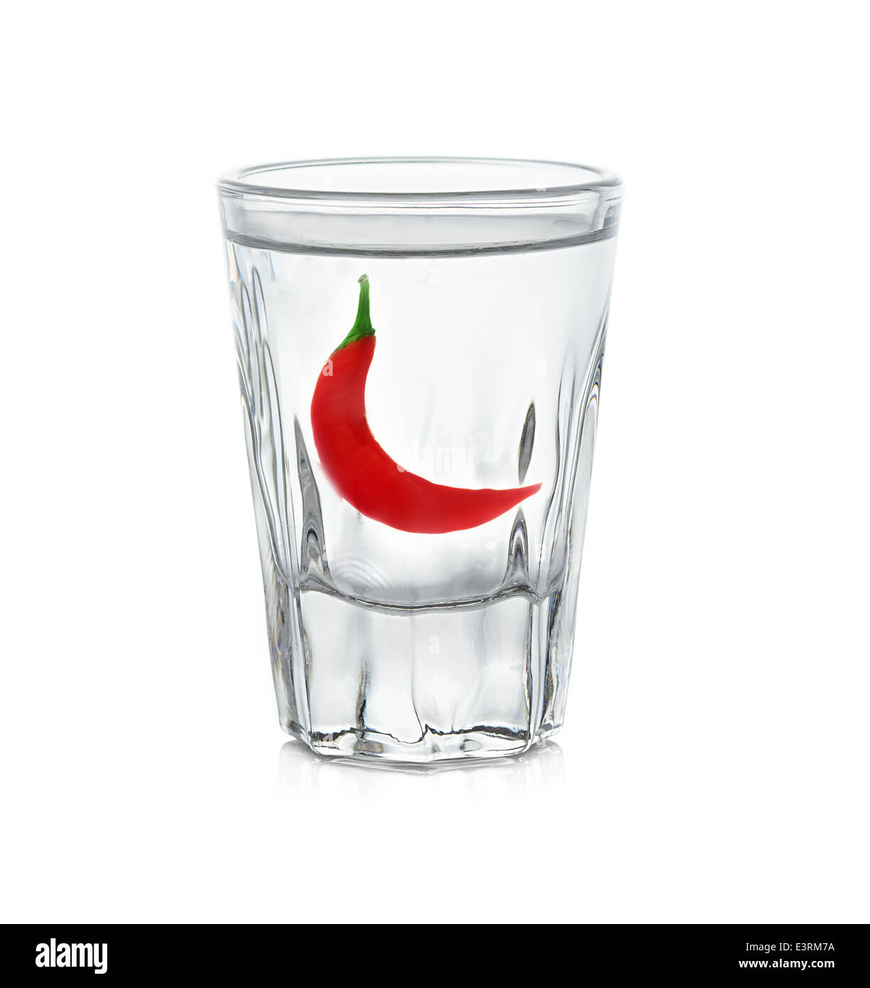 glass of vodka with red pepper isolated on white background Stock Photo ...