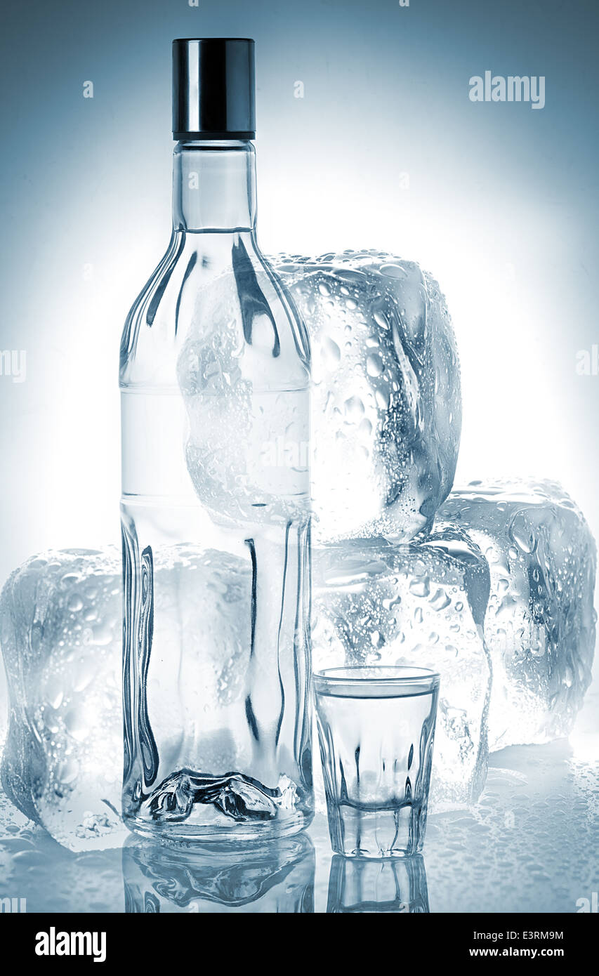 Bottle of vodka and ice cubes Stock Photo - Alamy