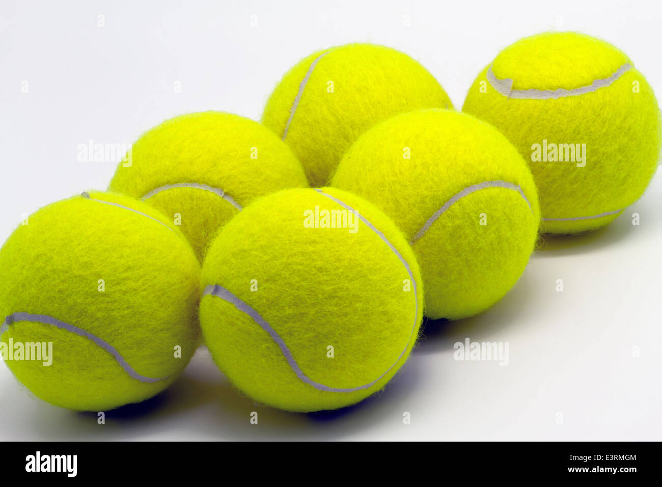 tennis balls on white background Stock Photo - Alamy