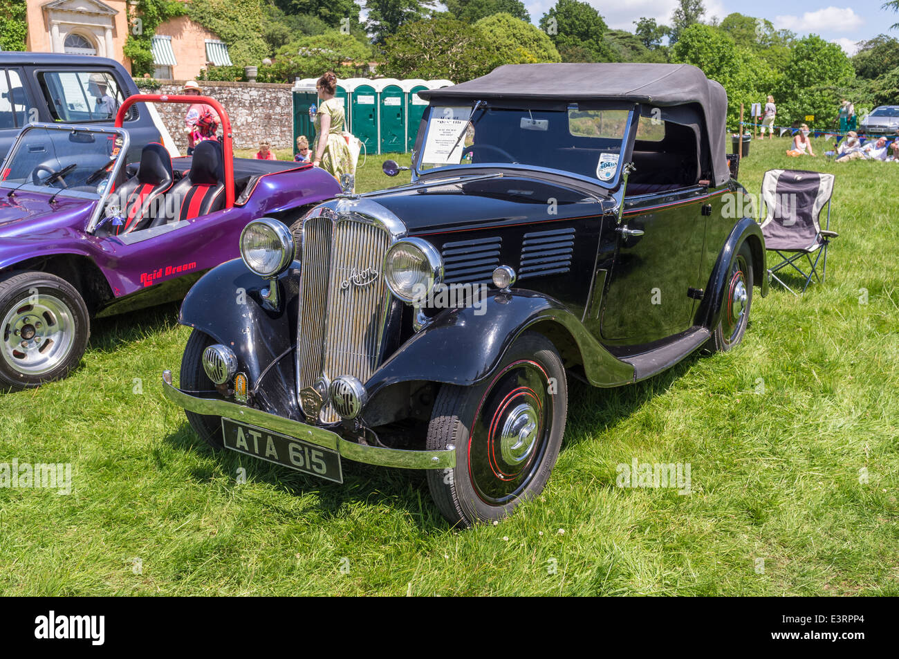 East Devon, England. A Fete and garden party with an old vintage 1934 ...