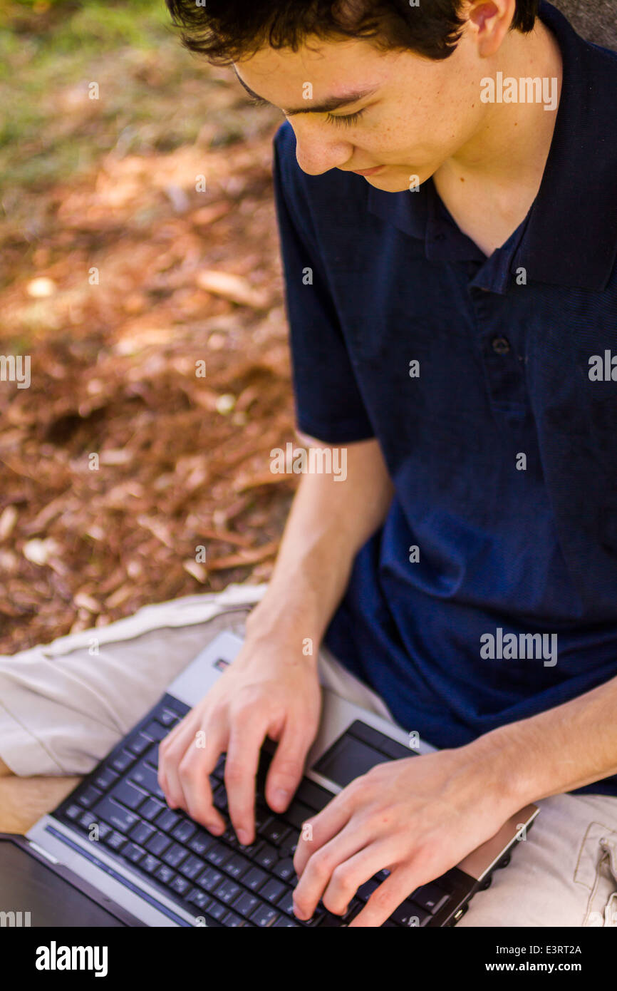 College student with laptop on campus Stock Photo - Alamy