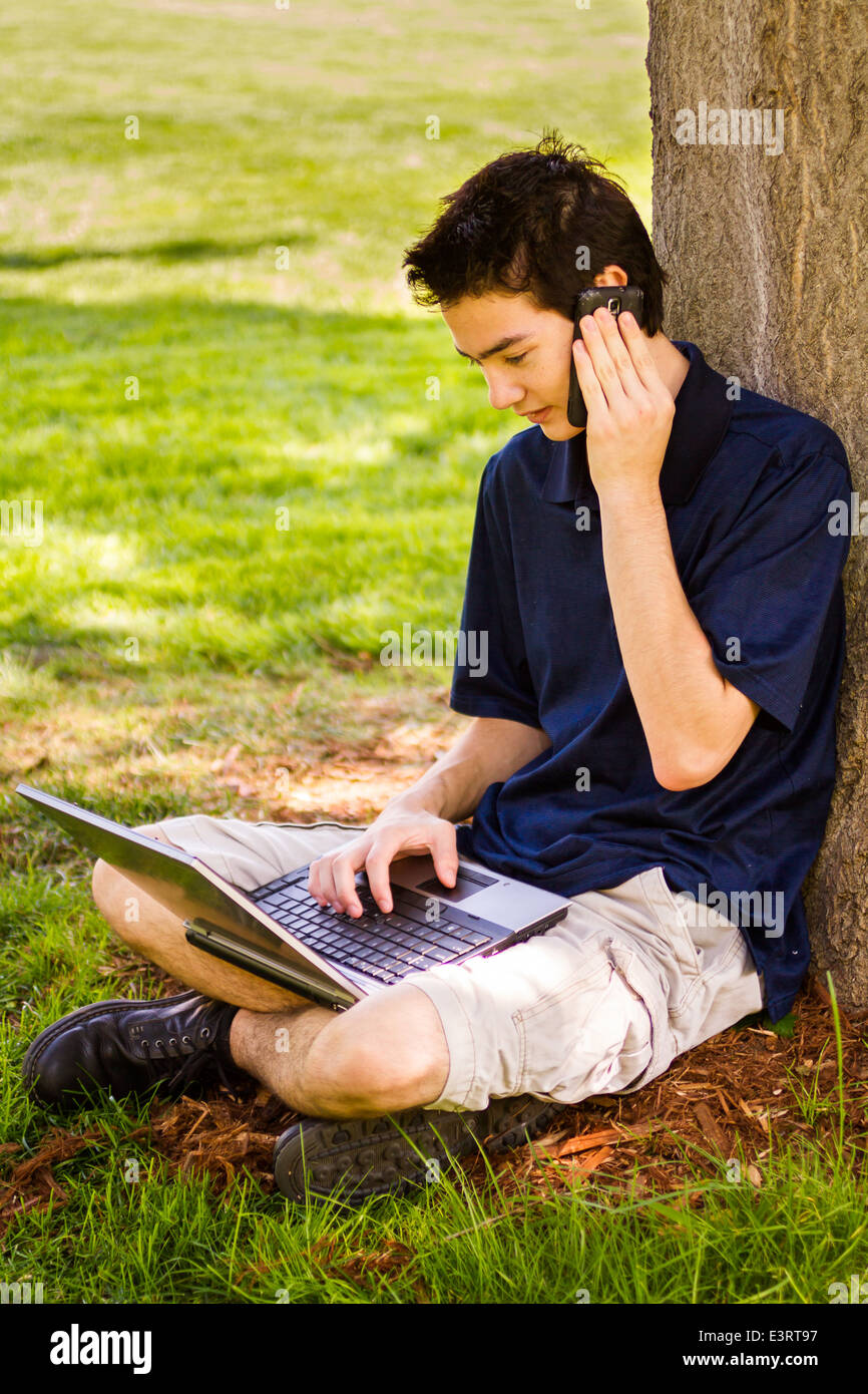 College student with laptop on campus Stock Photo - Alamy