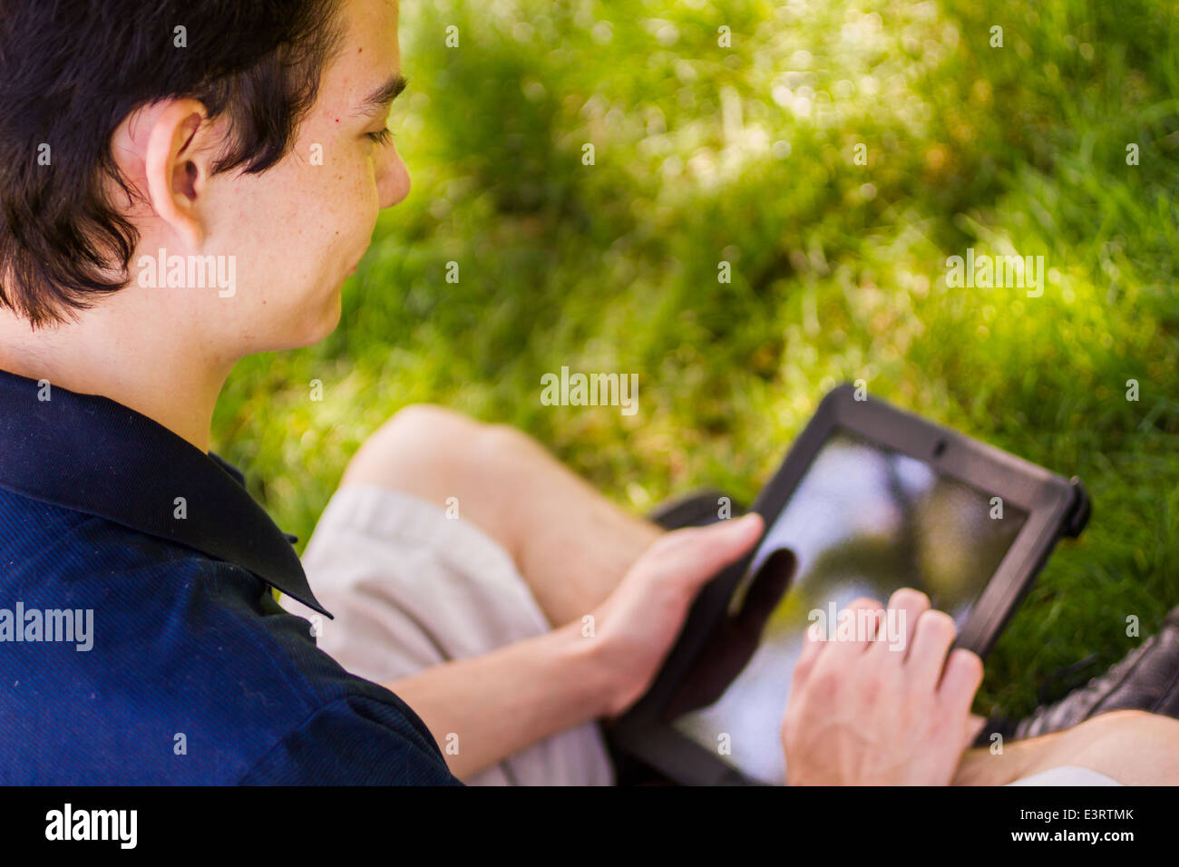 College student with computer tablet on campus Stock Photo - Alamy