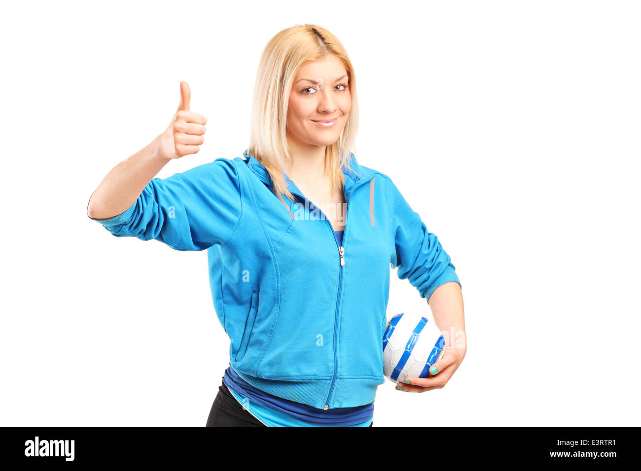 Professional female handball player giving thumb up Stock Photo - Alamy