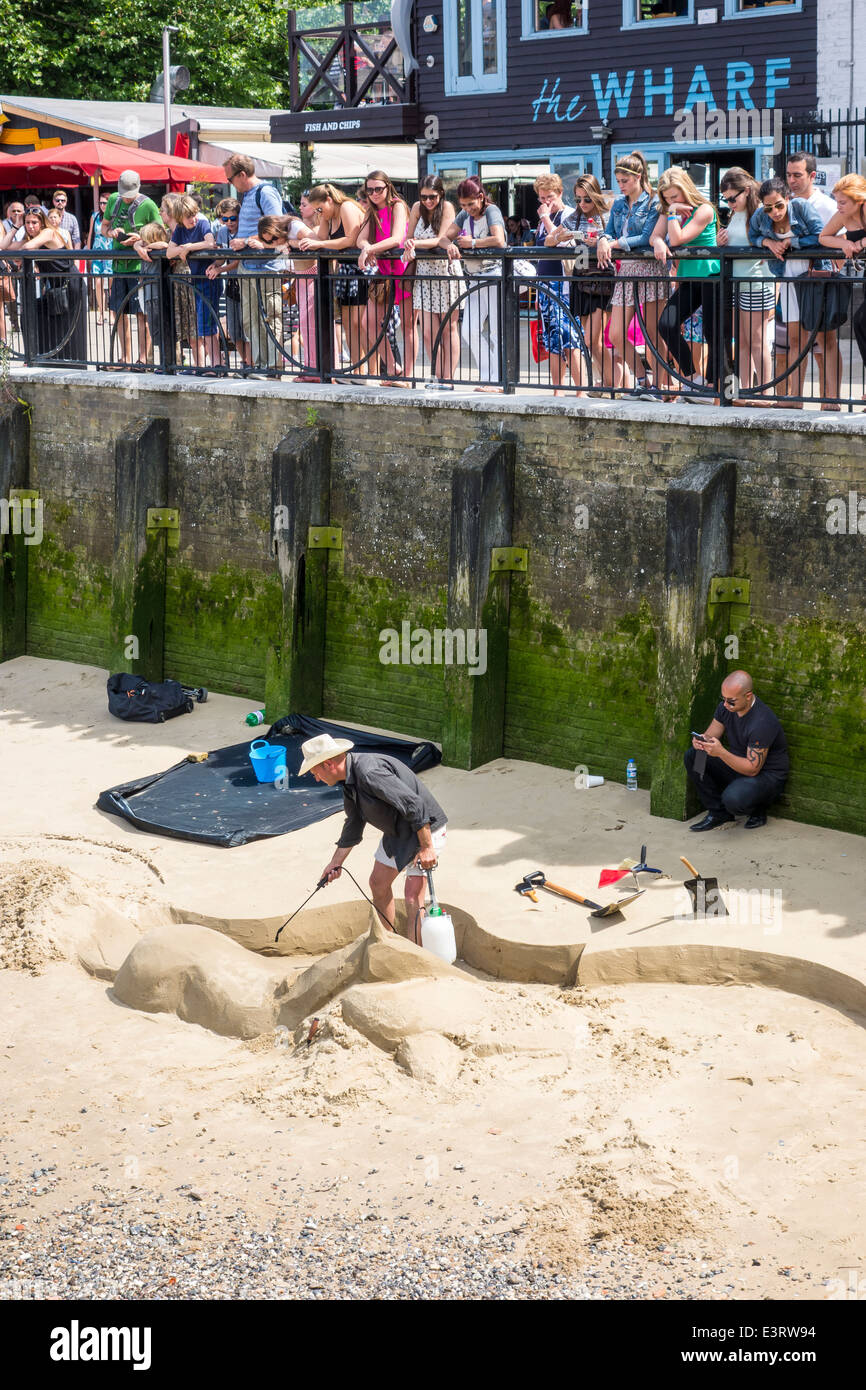 Sand Sculptor at work South Bank London Sand Sculpture Stock Photo - Alamy