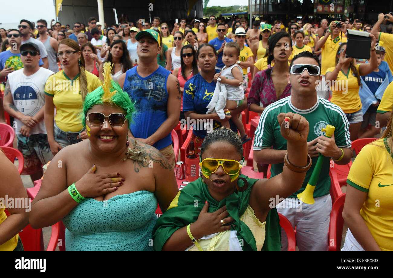 Brazilians sing the national anthem as they watch the FIFA soccer World ...