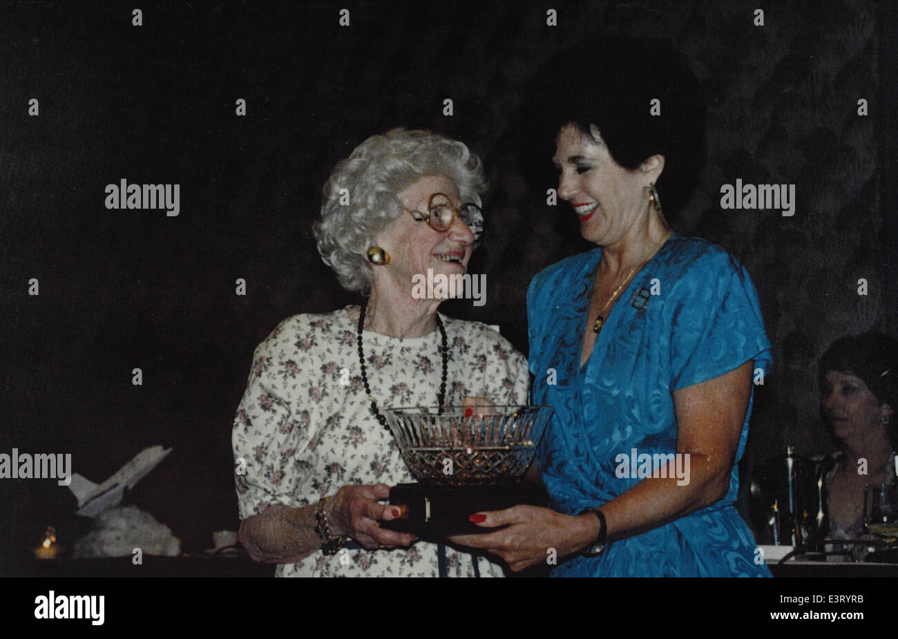 This image depicts Alice Hammond receiving an award from President ...