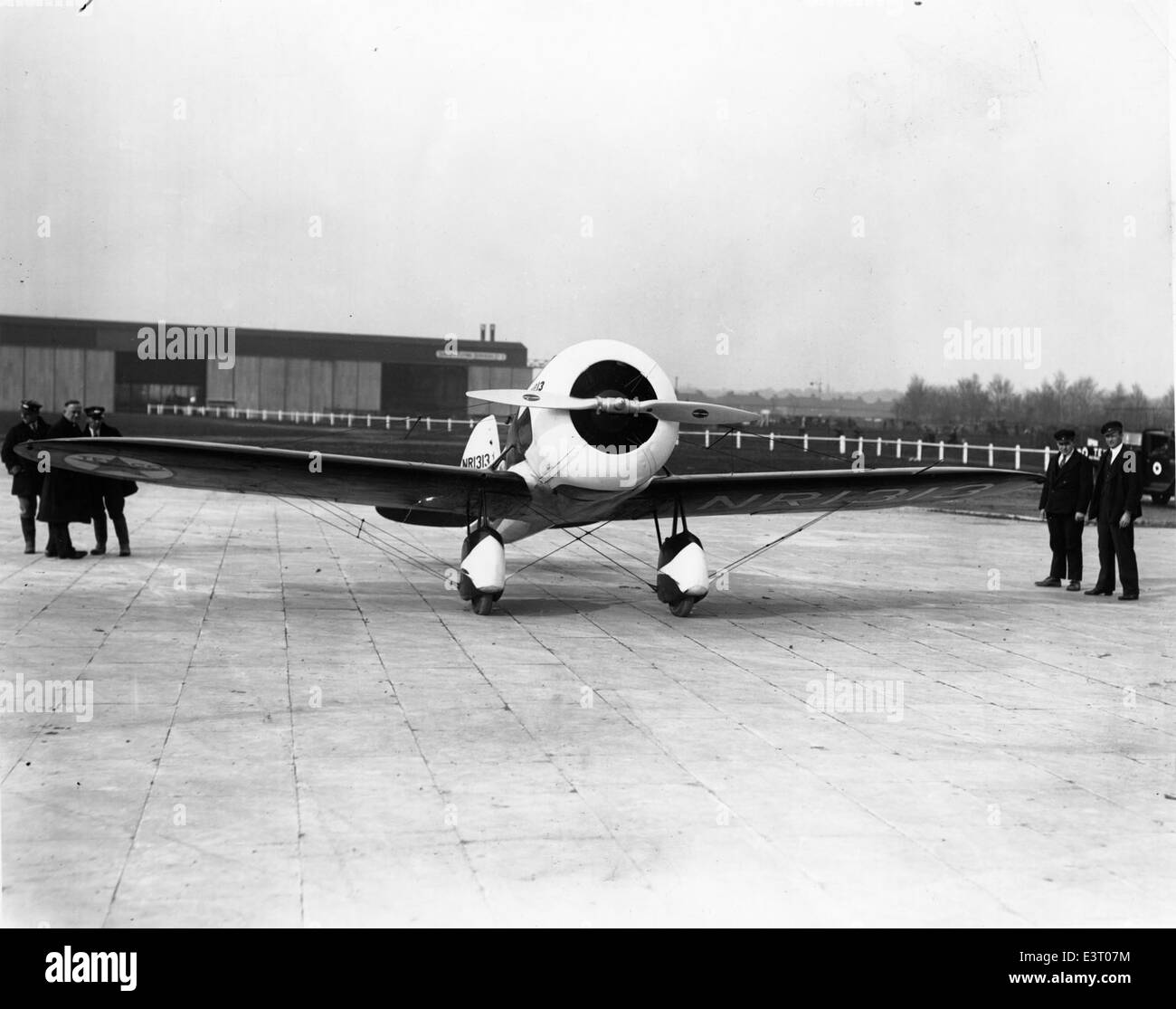This historical photograph shows the Air Racer, a famous aircraft from ...