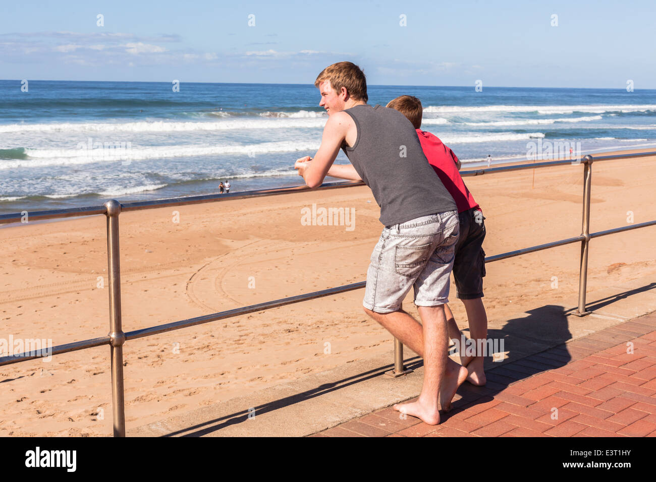 Watching ocean railing hi-res stock photography and images - Alamy