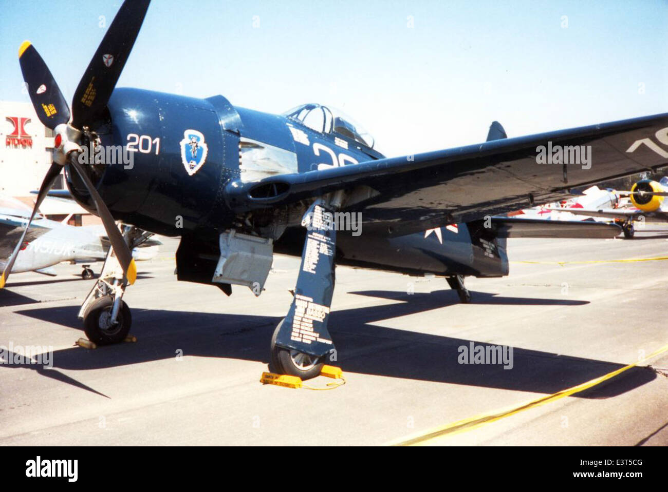 This photo features BuNo 122674, a Grumman F8F Bearcat aircraft. The ...