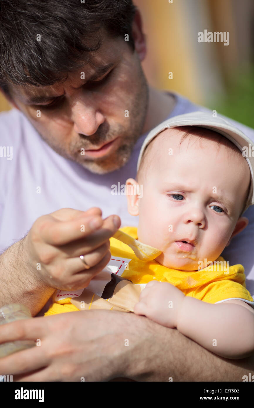 Father feed child hi-res stock photography and images - Alamy