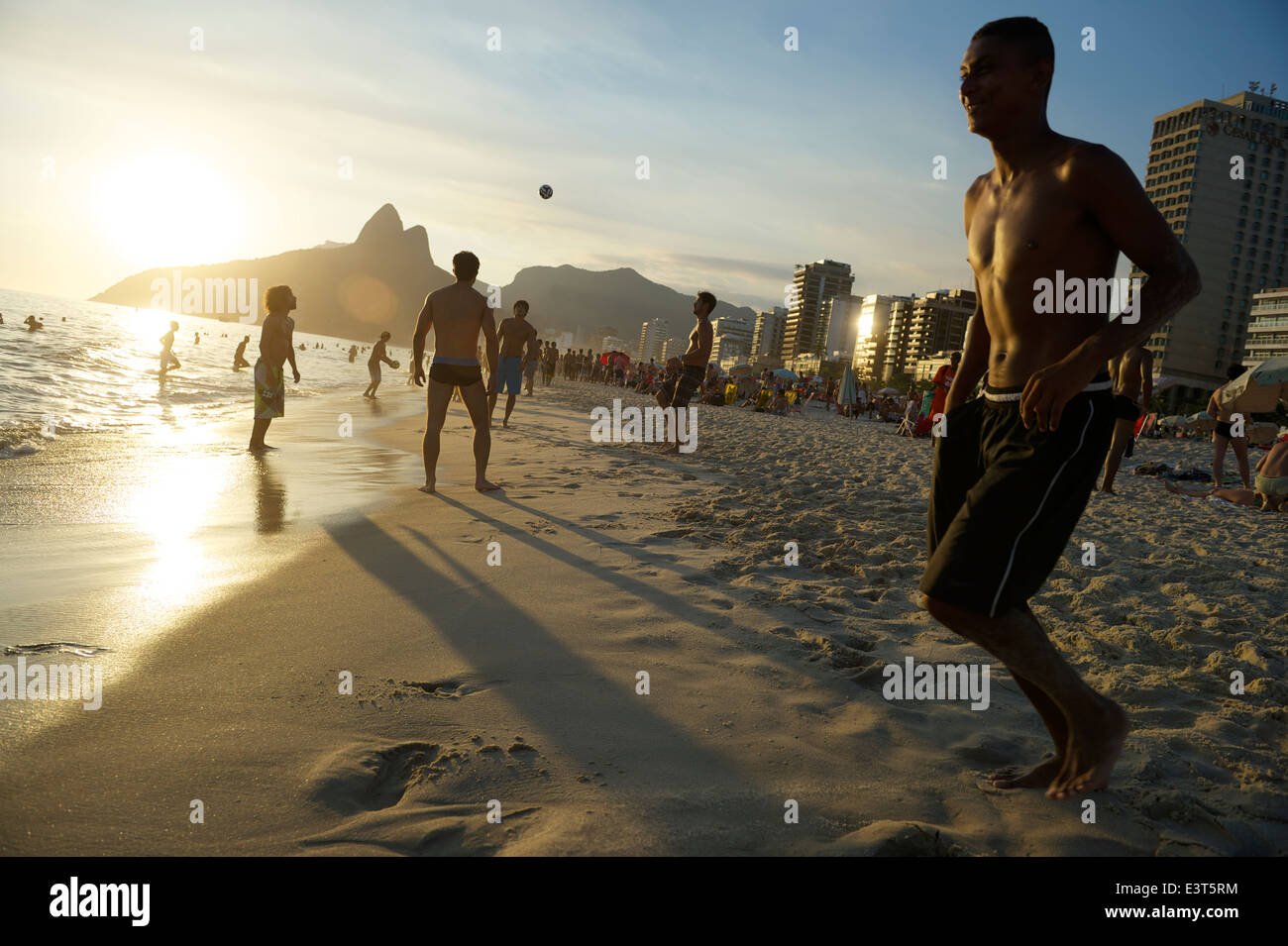 RIO DE JANEIRO, BRAZIL - JANUARY 25, 2014: Brazilians play keepy uppy ...