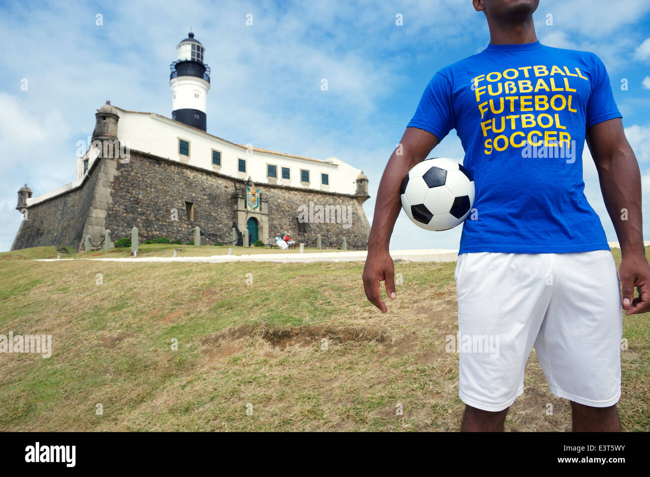 Brazilian footballer in international football shirt standing with ...