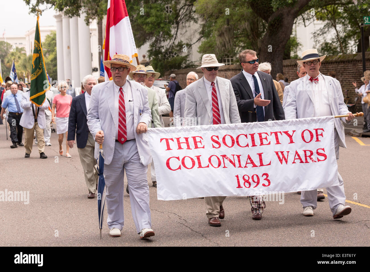 Members of the Society of Colonial Wars march down Meeting Street to ...