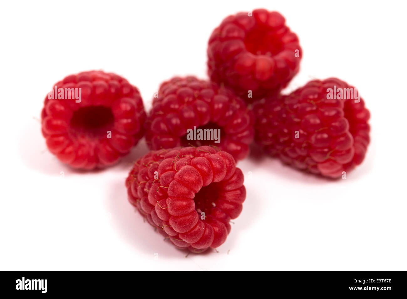 ripe red raspberry isolated on white background Stock Photo - Alamy