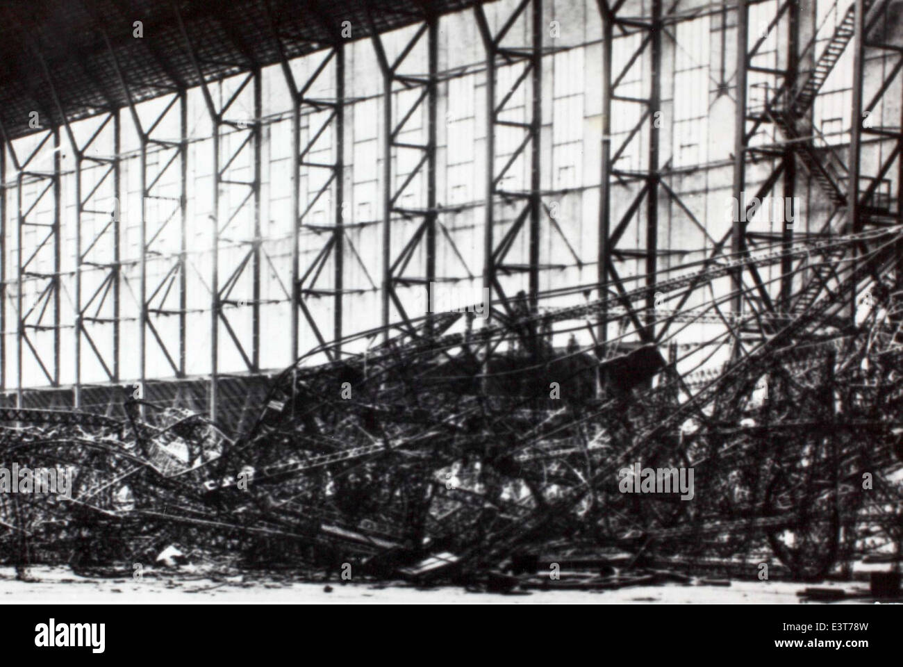 This image depicts a German airship destroyed by a British aerial bomb ...