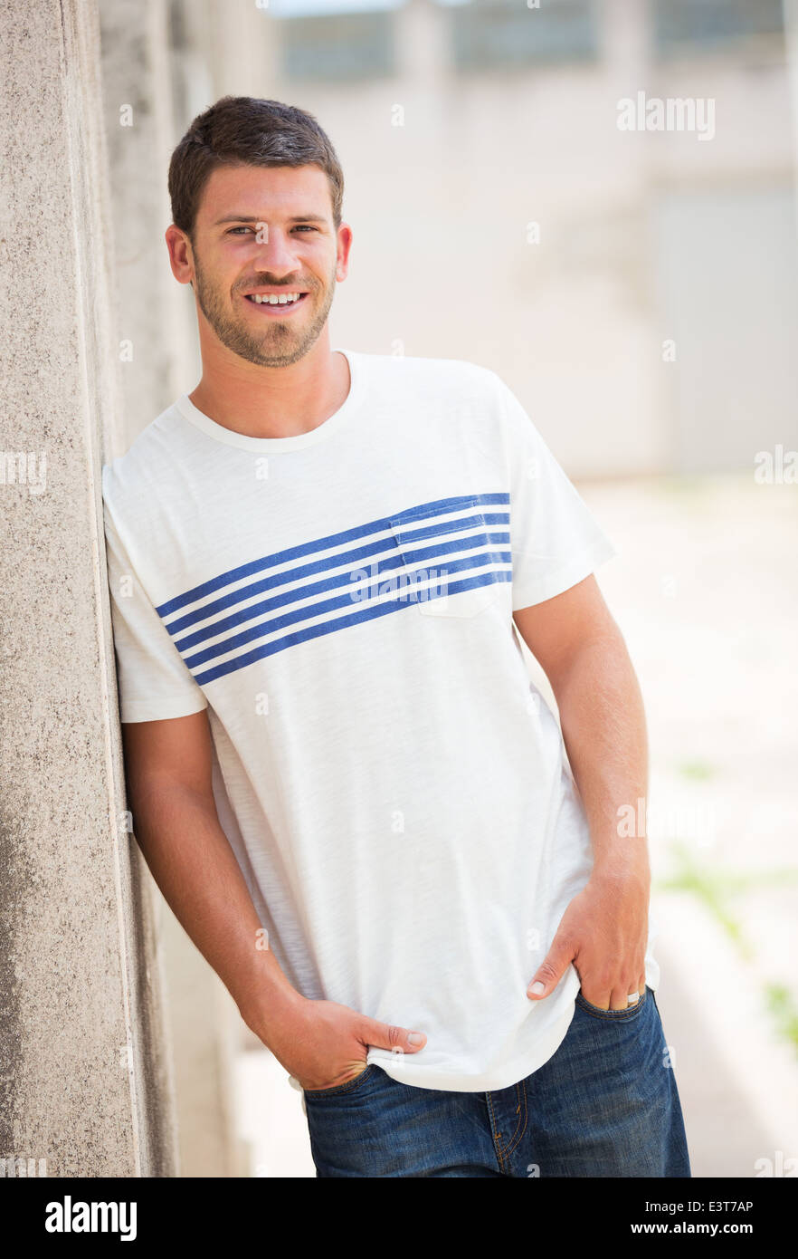 Portrait of young man in 20s. Confident, happy, and successful Stock ...