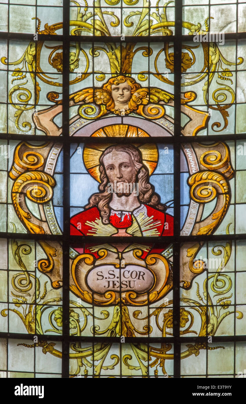 BRUSSELS, BELGIUM - JUNE 15, 2014: The Heart of Jesus in windowpane in ...
