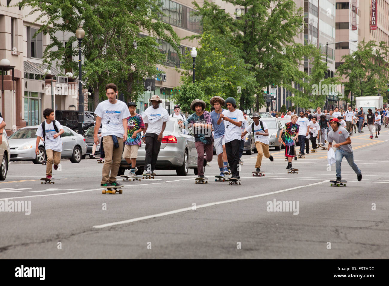 Street skateboarders riding in road - USA Stock Photo - Alamy