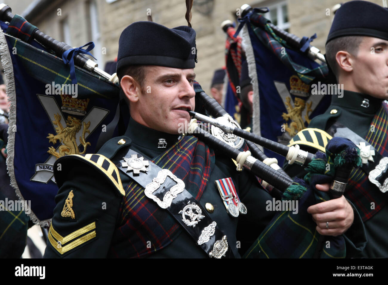 Stirling, UK. 28th June, 2014. A piper takes part in the celebration of ...