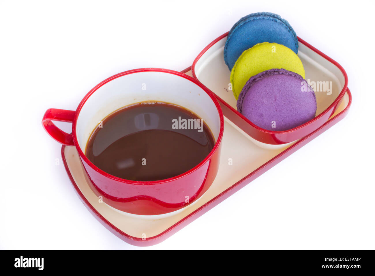 red cup of coffee and colorful Biscuit isolated on white background ...