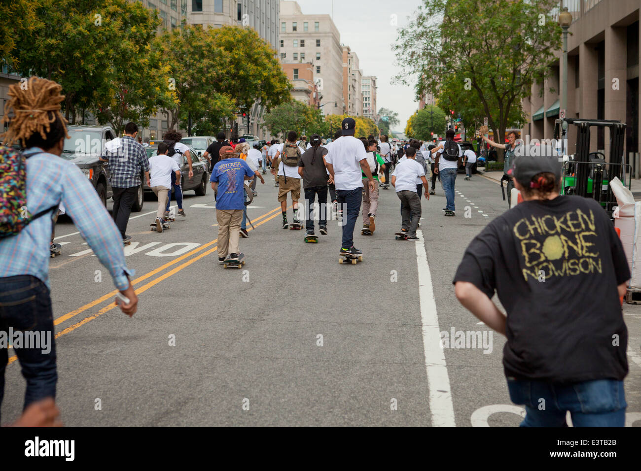 Street skateboarders riding in road - USA Stock Photo - Alamy