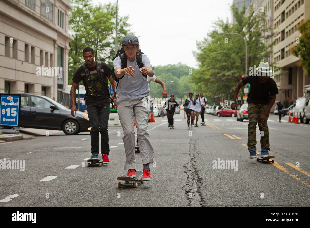 Street skateboarders riding in road - USA Stock Photo - Alamy