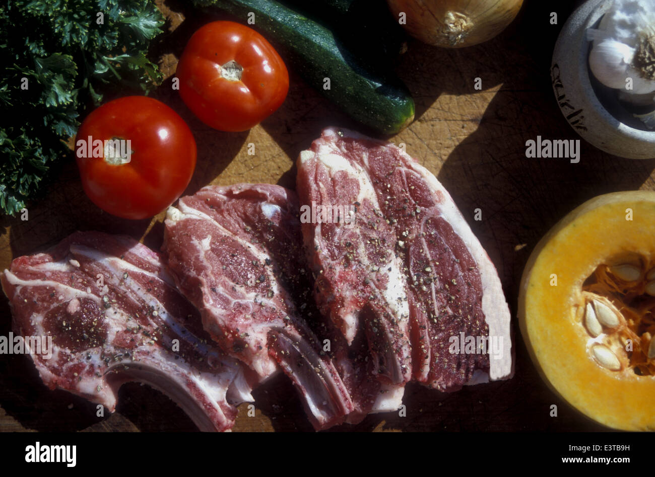 Lamb chump chops and vegetables for a meat recipe Stock Photo - Alamy