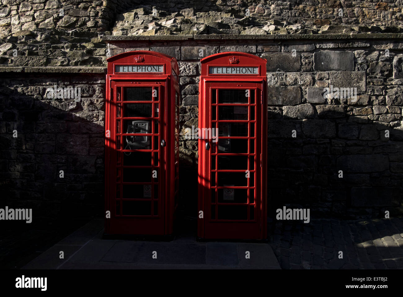 Red telephone booths at the Edinburgh's Castle in Scotland Stock Photo ...