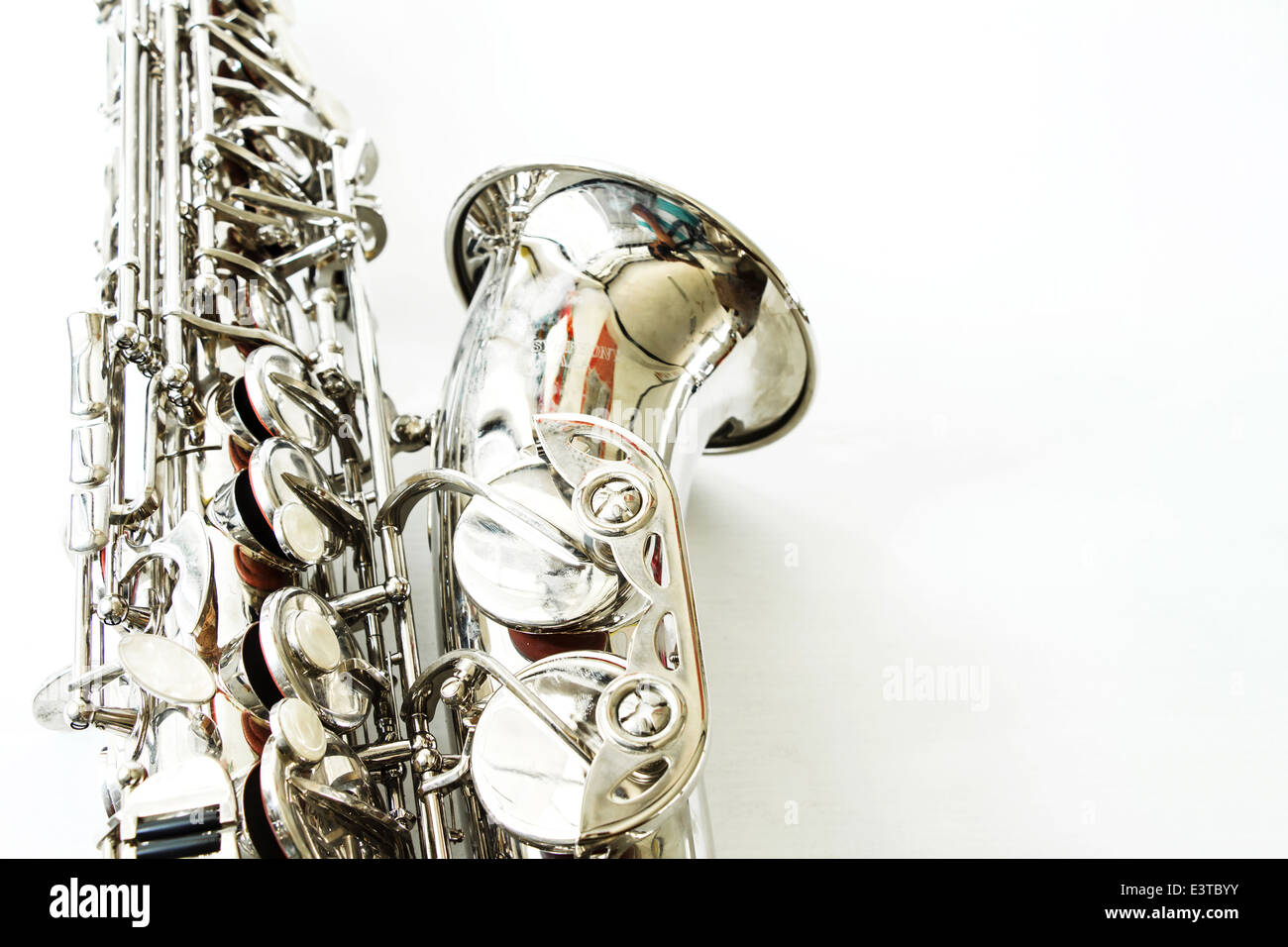 Saxophone isolated on white background Stock Photo - Alamy