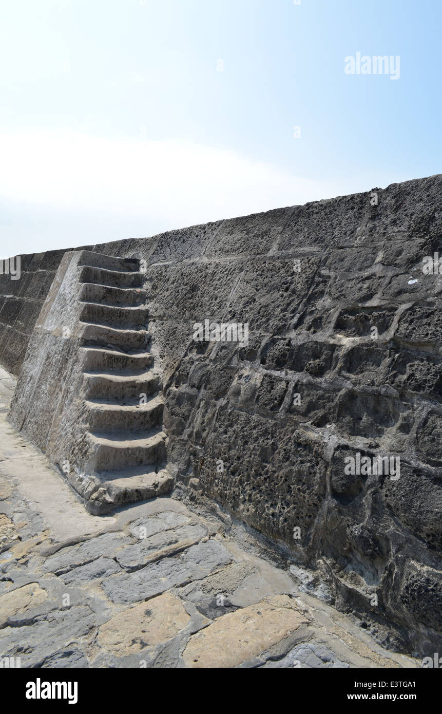 Stone steps on a old English sea wall at Lyme Regis Stock Photo - Alamy