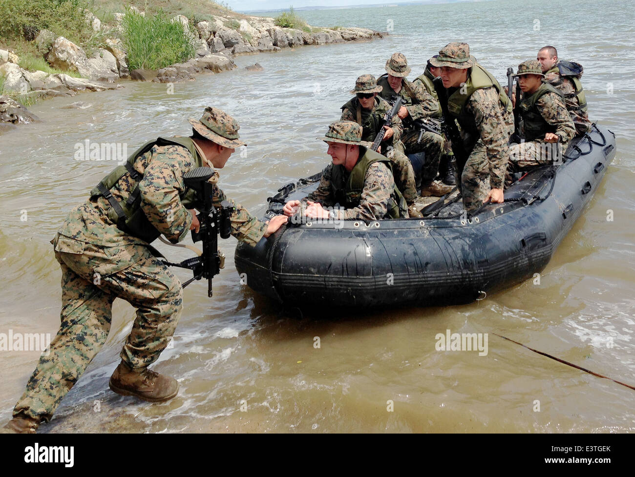 US Marines and Romanian sailors conduct beach reconnaissance during ...