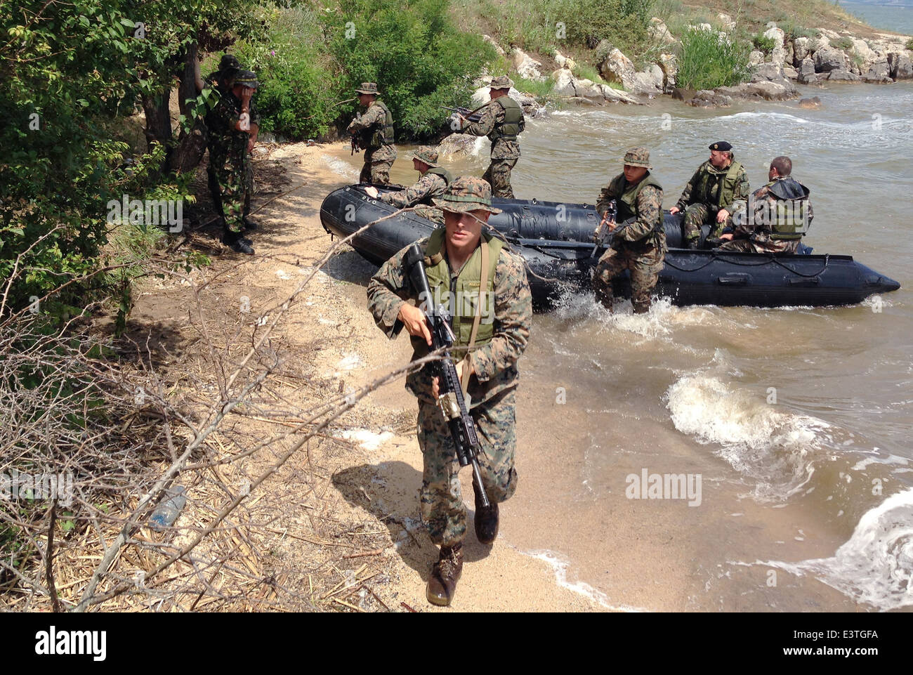 US Marines and Romanian sailors conduct beach reconnaissance during ...