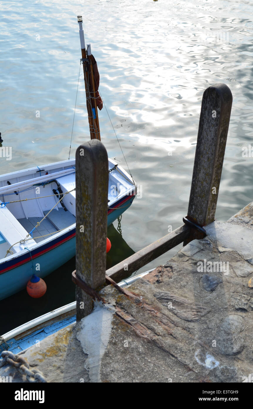 Ready to board? A small sailing boat at the quayside Stock Photo - Alamy